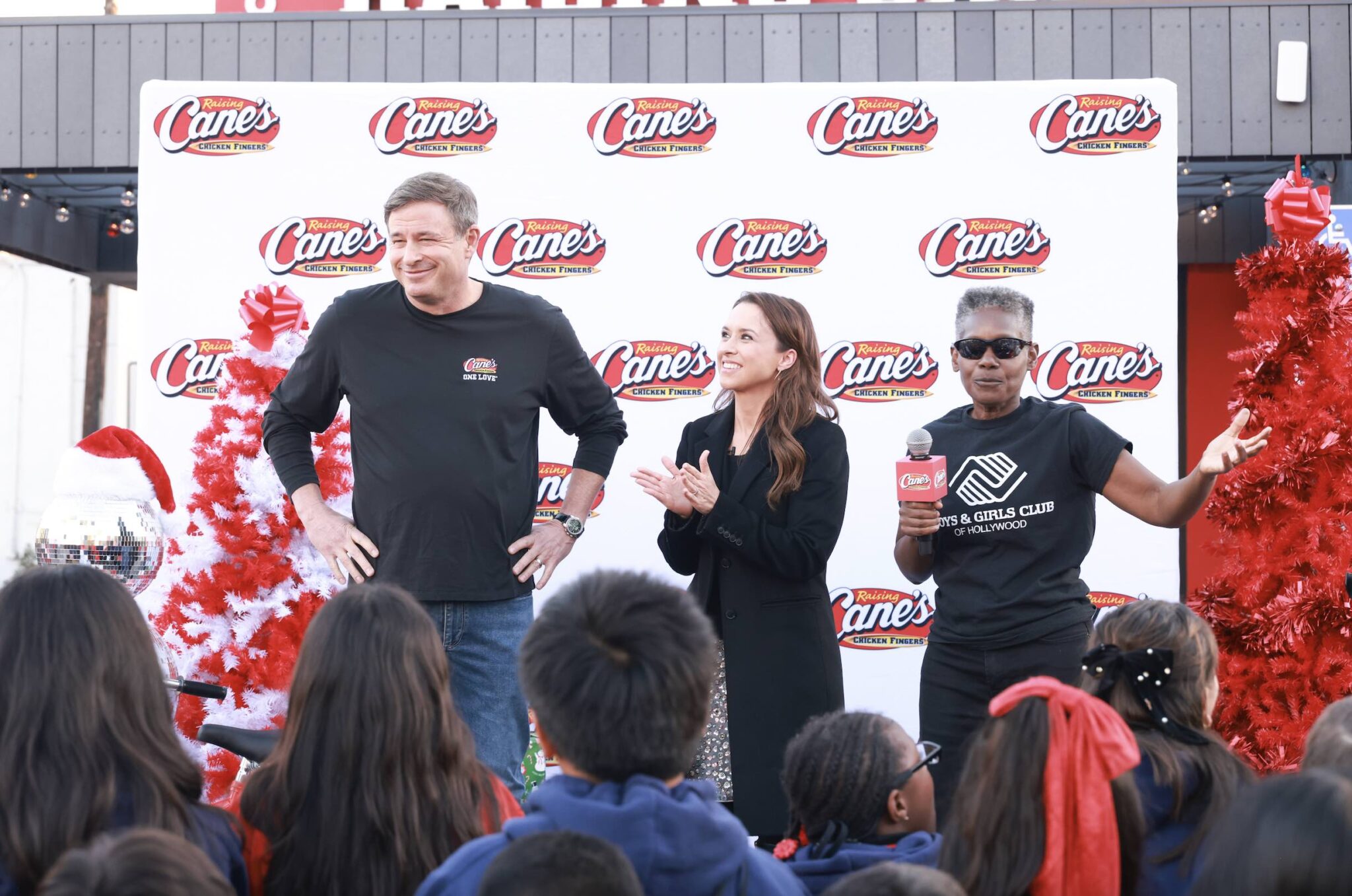 Lacey Chabert & Raising Cane’s Donate Bikes to Boys & Girls Club | hoopLA